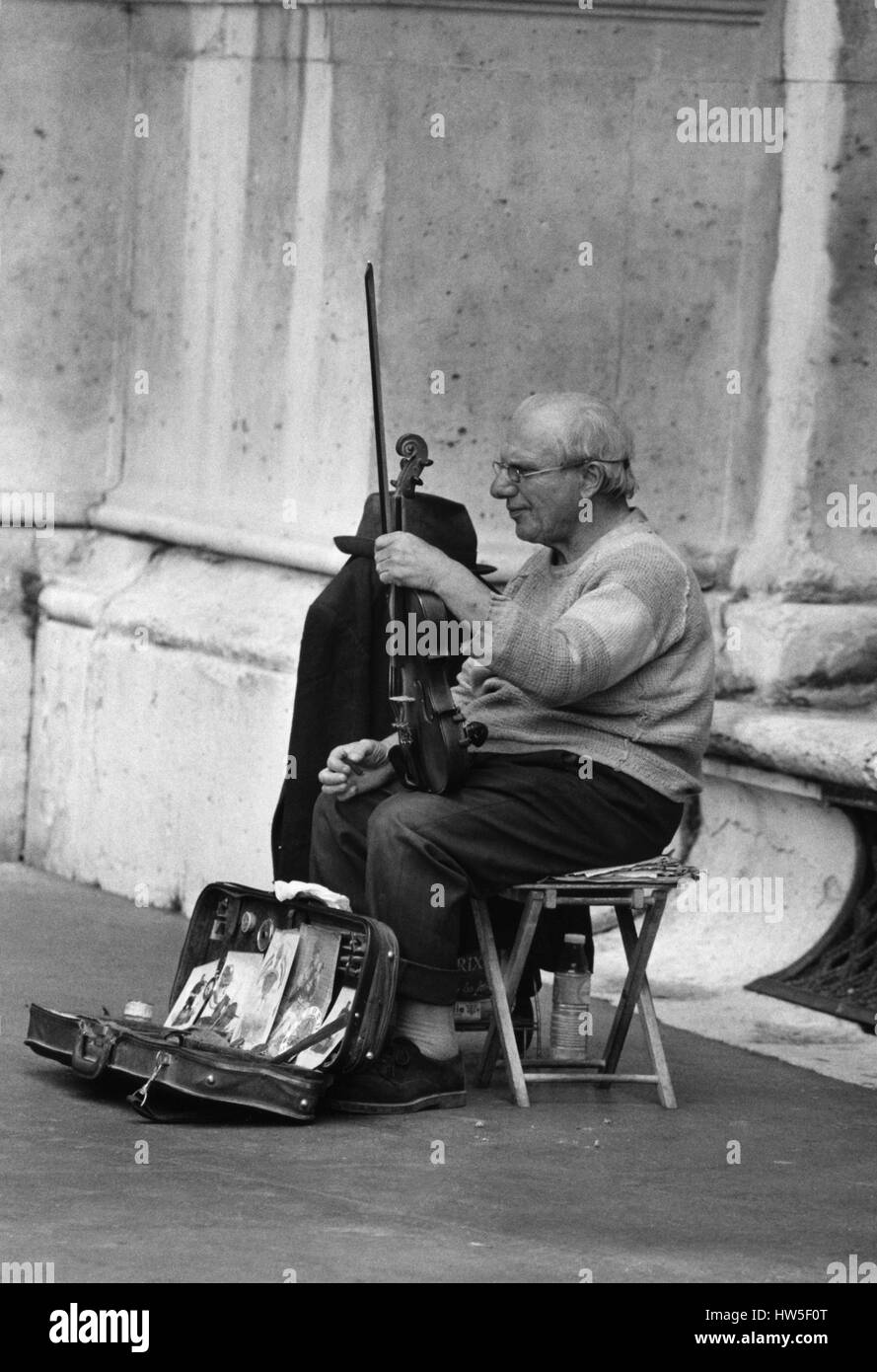 Busker with violin Black and White Stock Photos & Images - Alamy