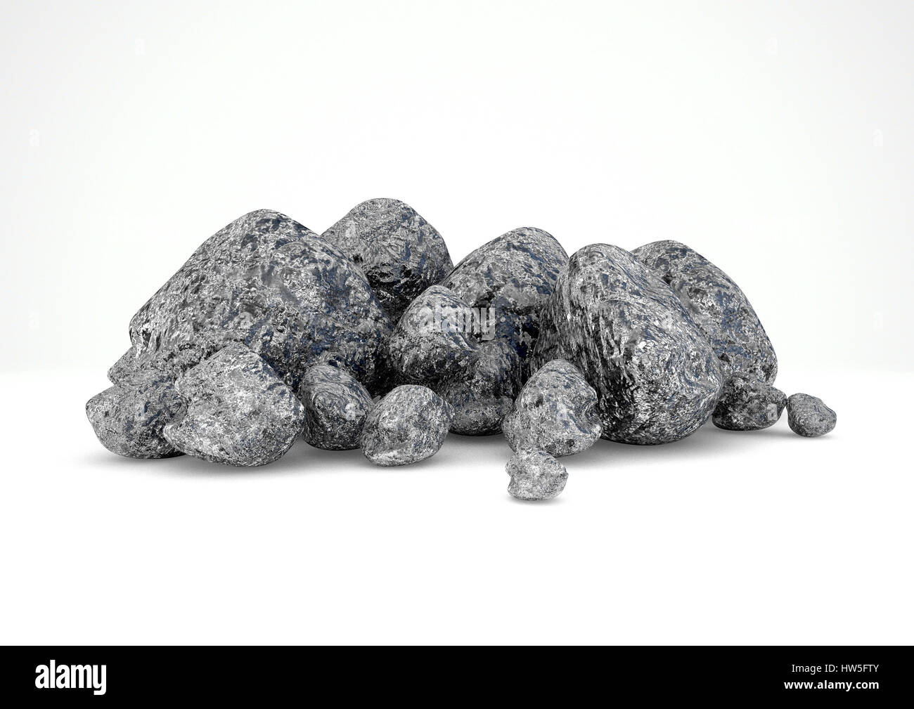 A collection of iron ore nuggets on an isolated white studio background ...