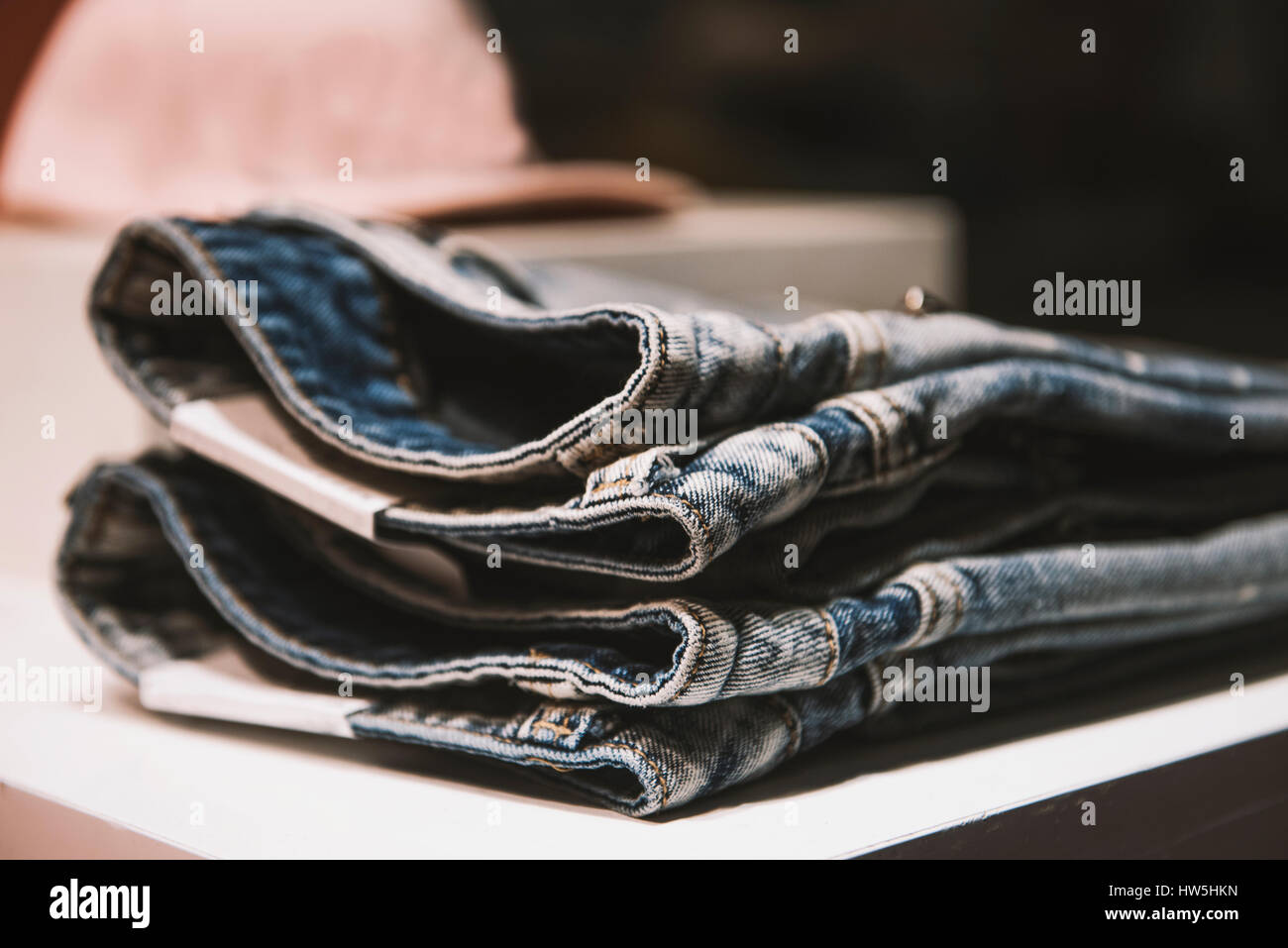 Stack denim jeans retail store hi-res stock photography and images - Alamy