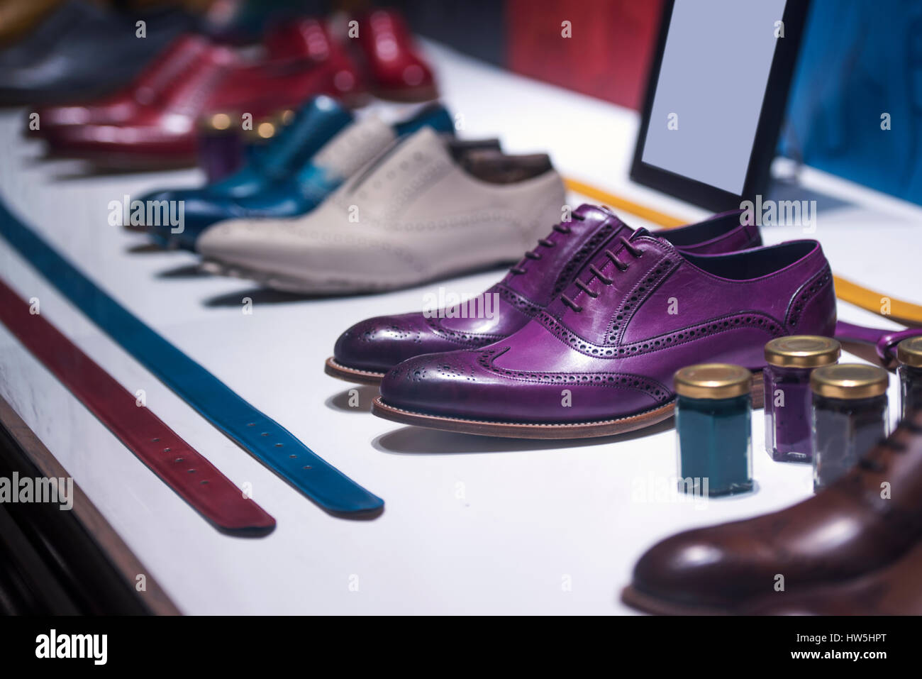 Fancy colorful shoes in a men clothing store Stock Photo - Alamy