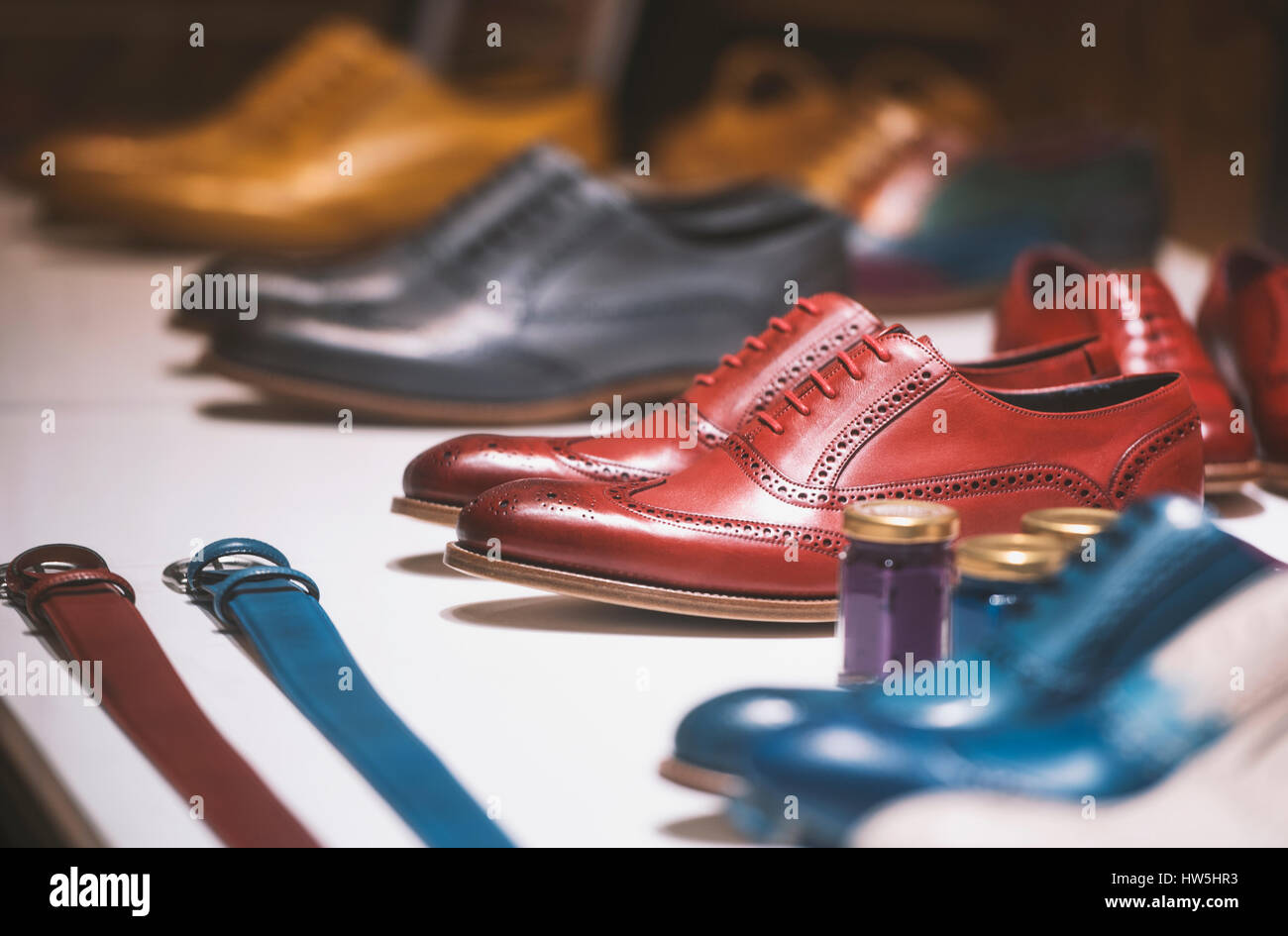 Fancy colorful shoes in a men clothing store Stock Photo - Alamy