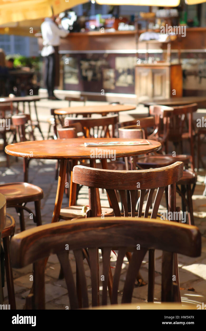 empty little tables of cafeteria on the street at sun day Stock Photo ...