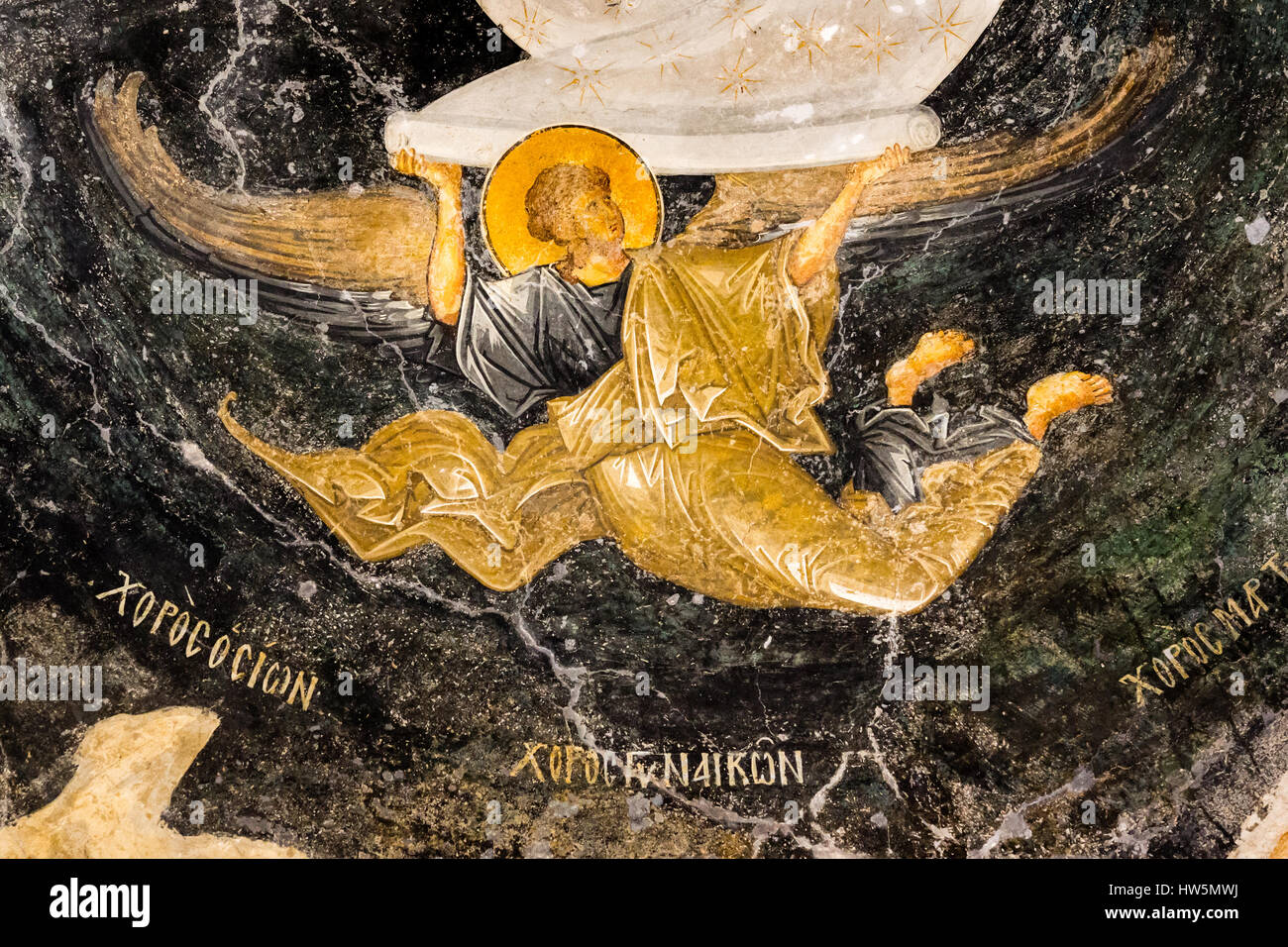Angel holds the scroll of heaven, an old byzantine wall-painting in ...
