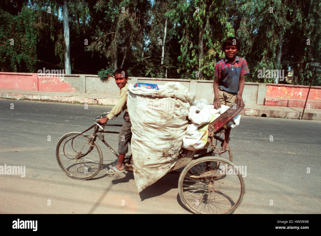 Boys collecting rubbish, Agra, India Stock Photo - Alamy