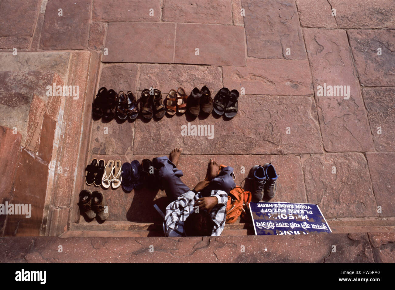 Shoe minder, Agra, India Stock Photo - Alamy