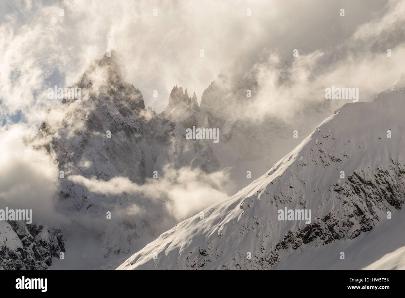 Alps. Cloudy heights of Mont Blanc, Italy Stock Photo - Alamy