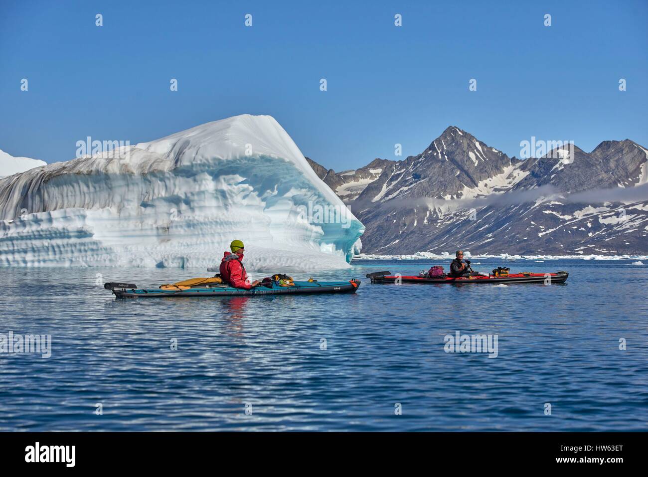 Greenland, Sermersooq, Kulusuk, Inuit village of Kulusuk, sea kayaks in ...