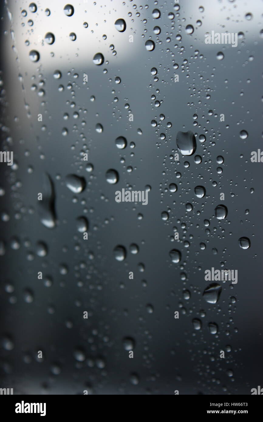 water drops dripping on a window Stock Photo - Alamy