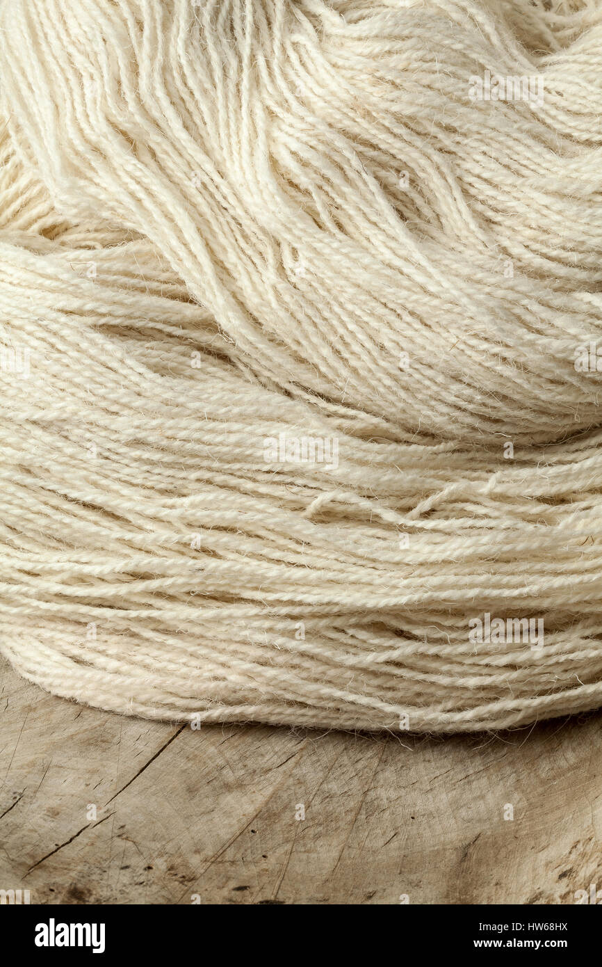 Image of natural handmade white sheep wool yarn with needles Stock ...