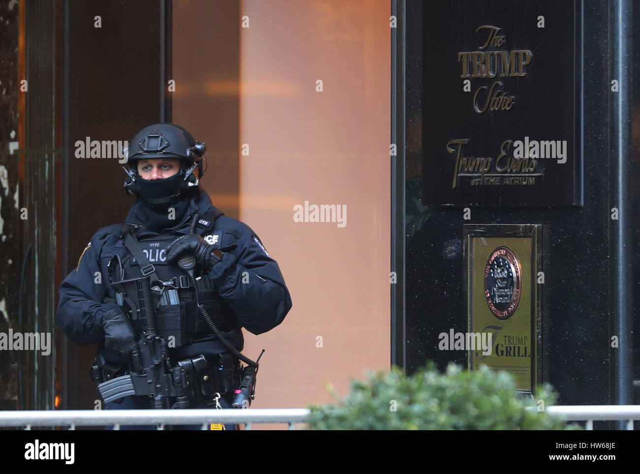 A general view of an armed police officer outside Trump Tower in New ...