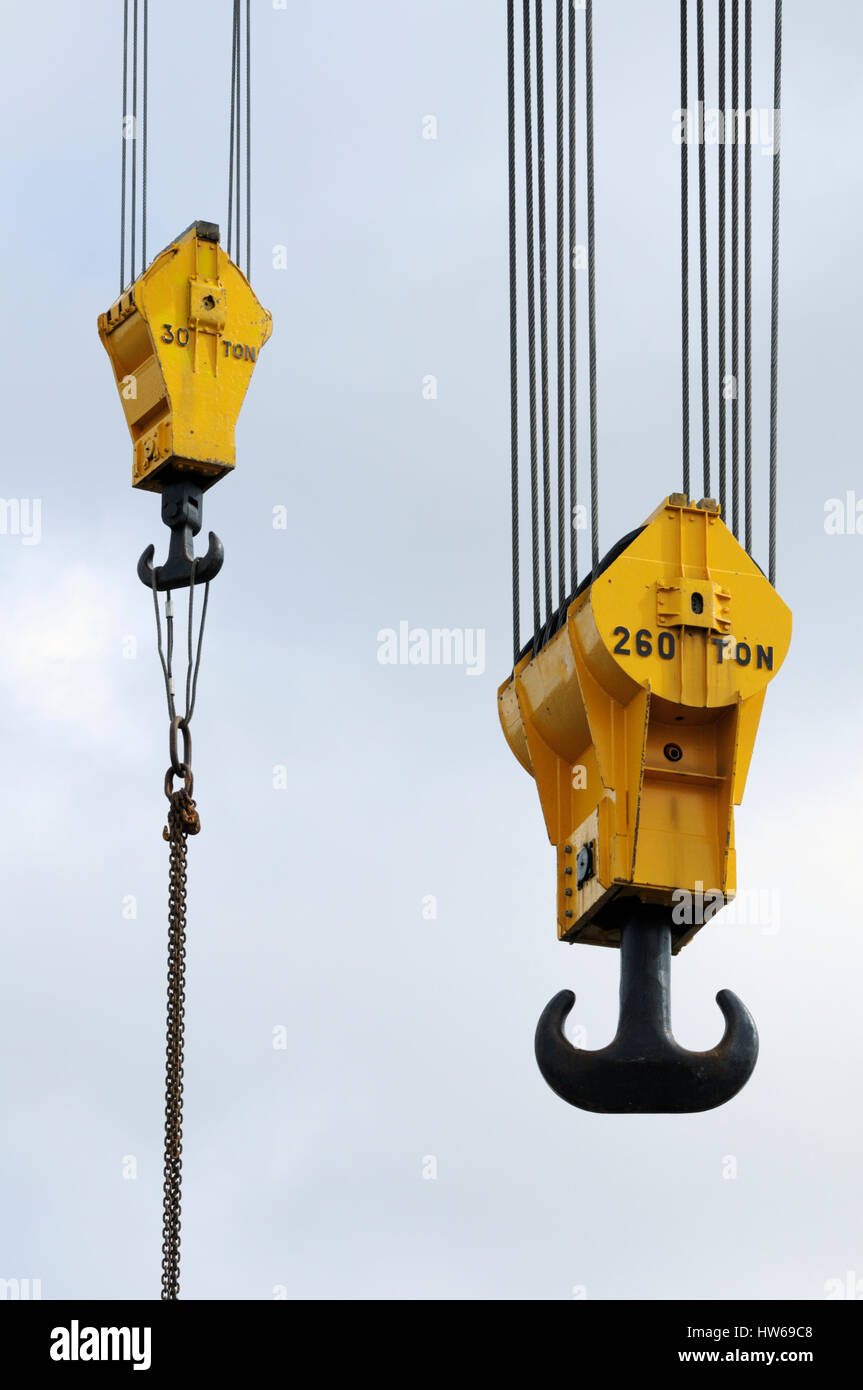 Crane hooks on construction site, low angle Stock Photo - Alamy