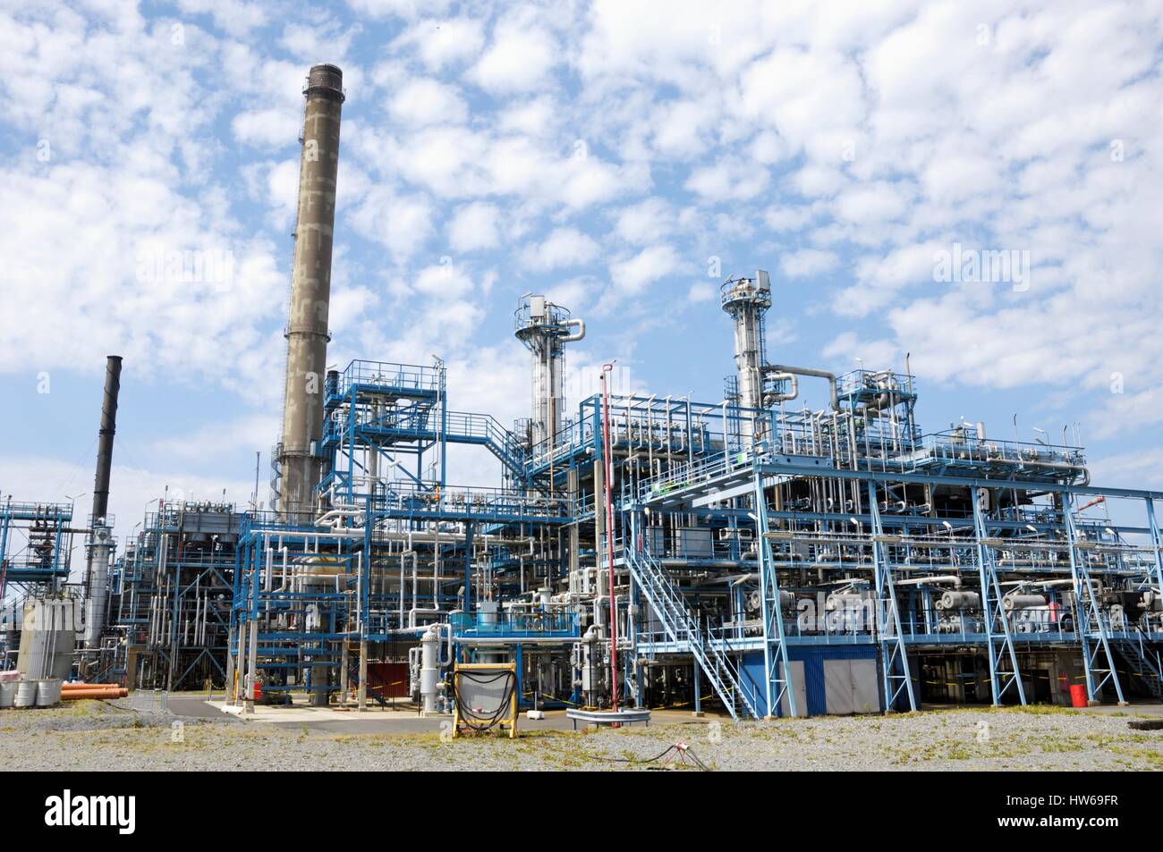 Oil refinery with pipework and chimneys Stock Photo - Alamy