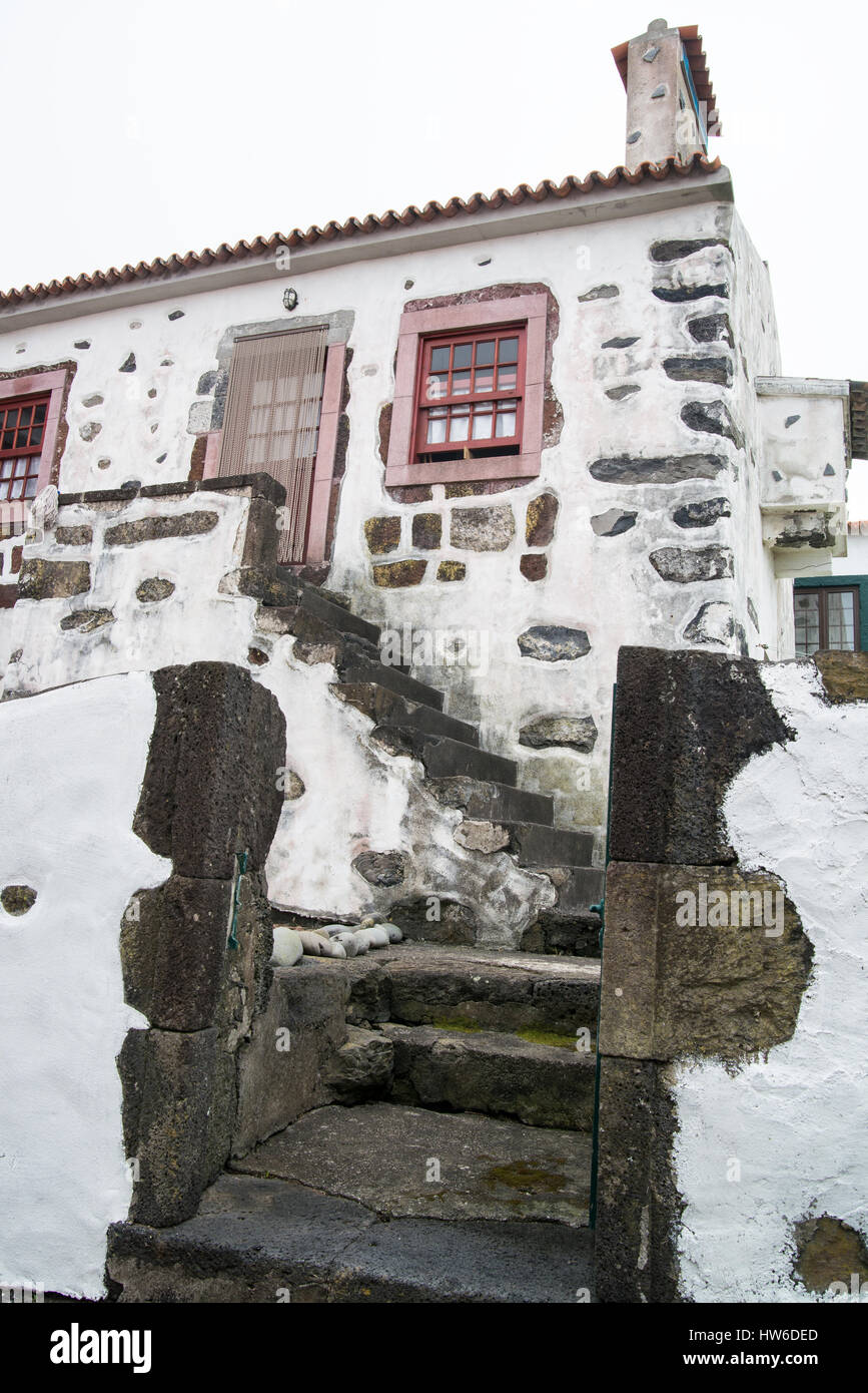 Traditional stone house in green landscape of Azores island Stock Photo ...