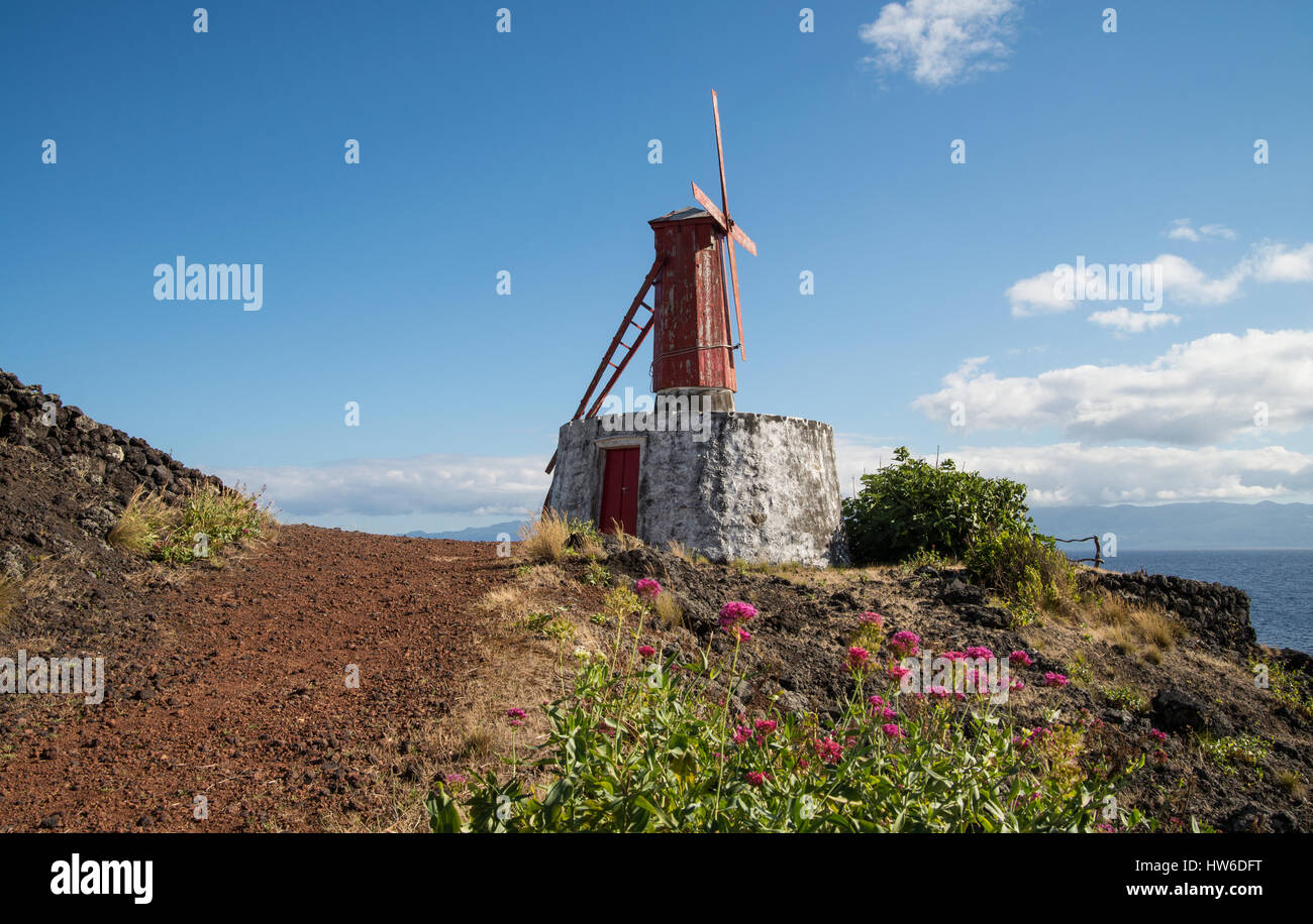 Beautiful windmill in Azores landscape Stock Photo - Alamy
