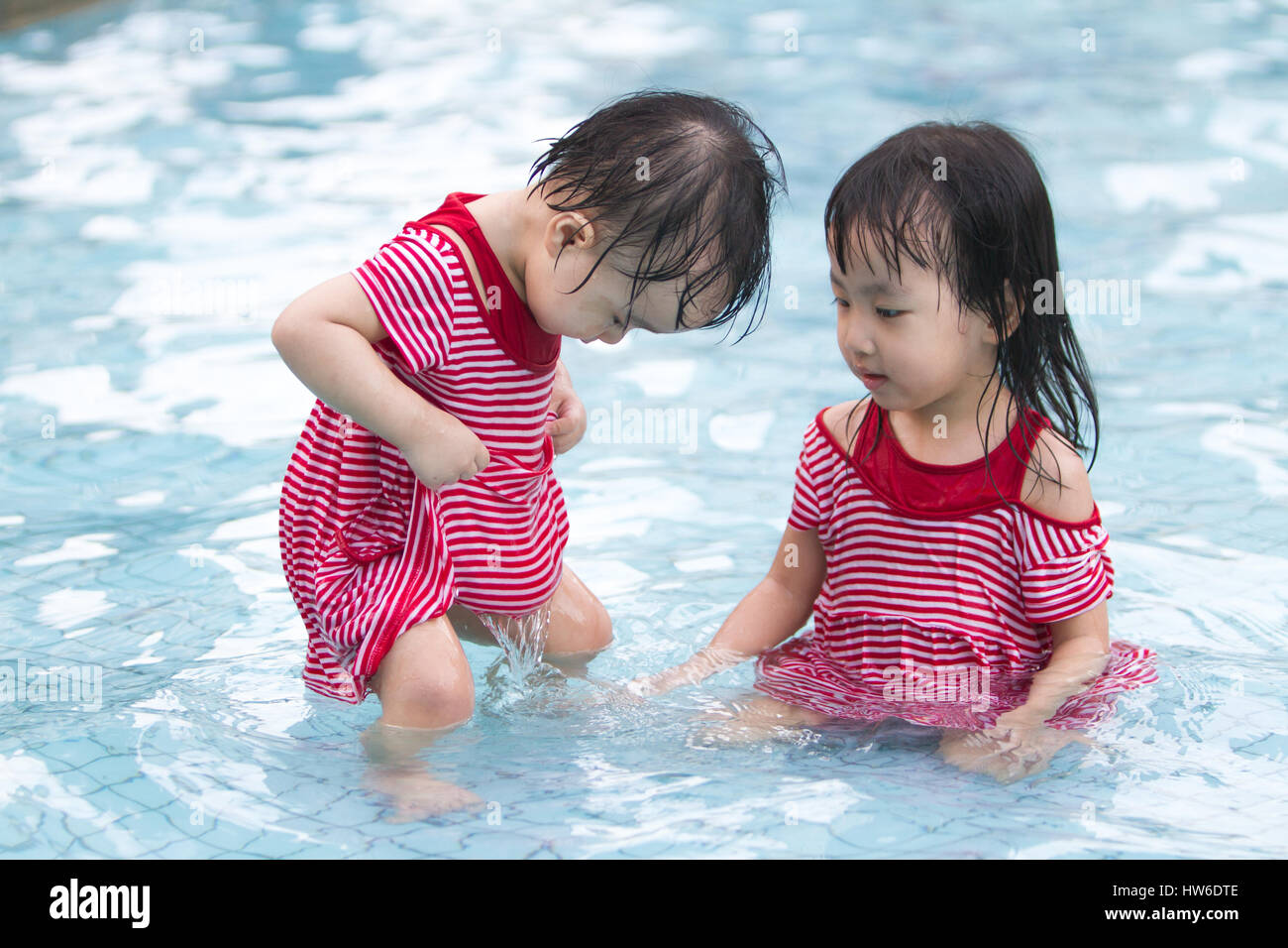 Two sisters friend swimming in hi-res stock photography and images - Alamy