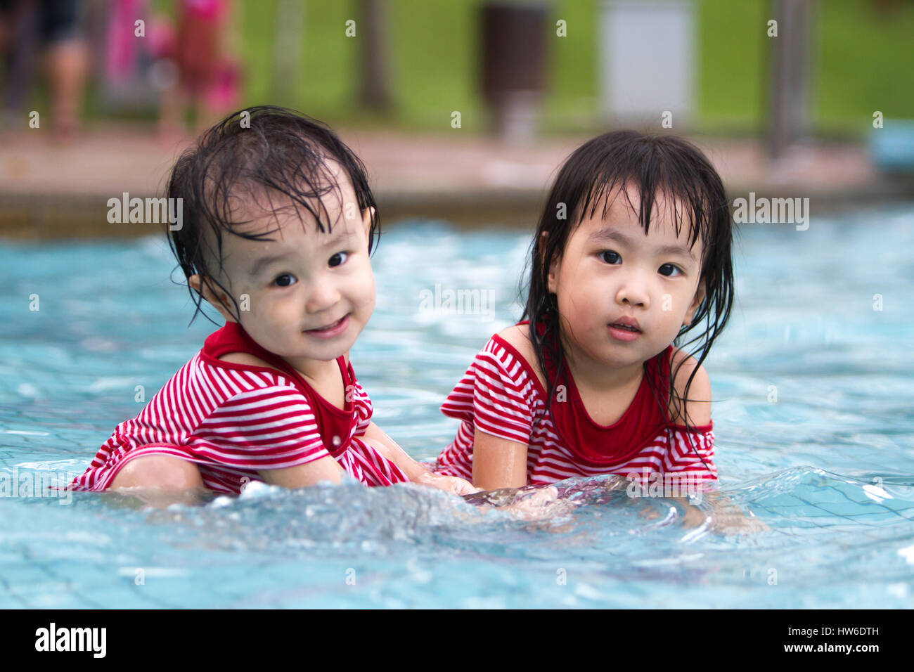 Two sisters friend swimming in hi-res stock photography and images - Alamy