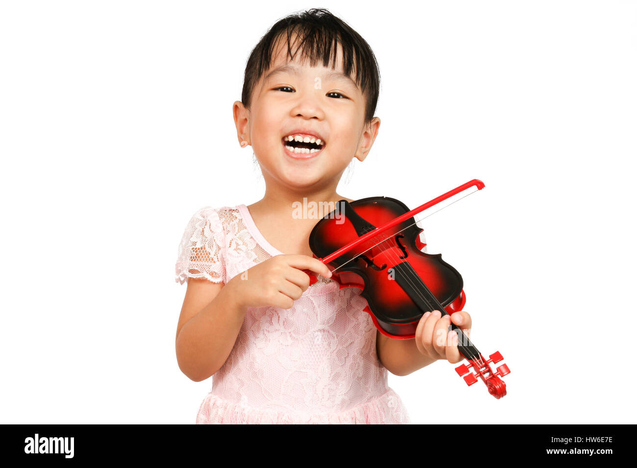 Chinese Little Girl Playing Violin on a white background Stock Photo ...