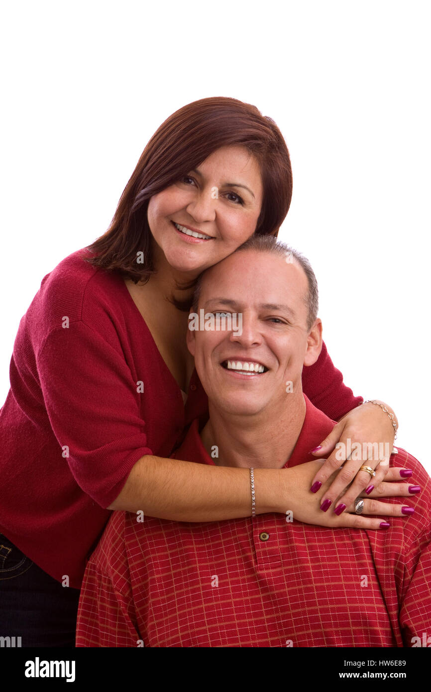 Hispanic couple hugging isolated on white Stock Photo - Alamy