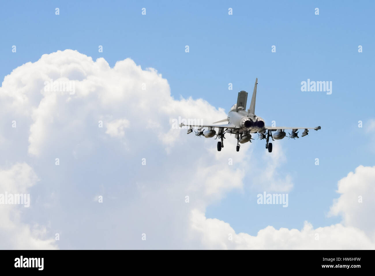fully loaded unmarked military fighter jet on landing approach Stock ...