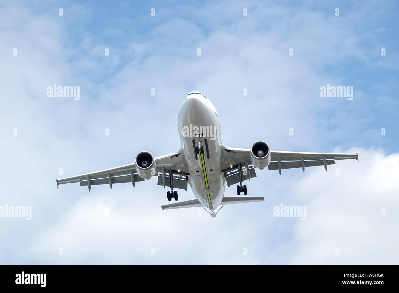 large passenger jet aircraft on final landing approach Stock Photo - Alamy