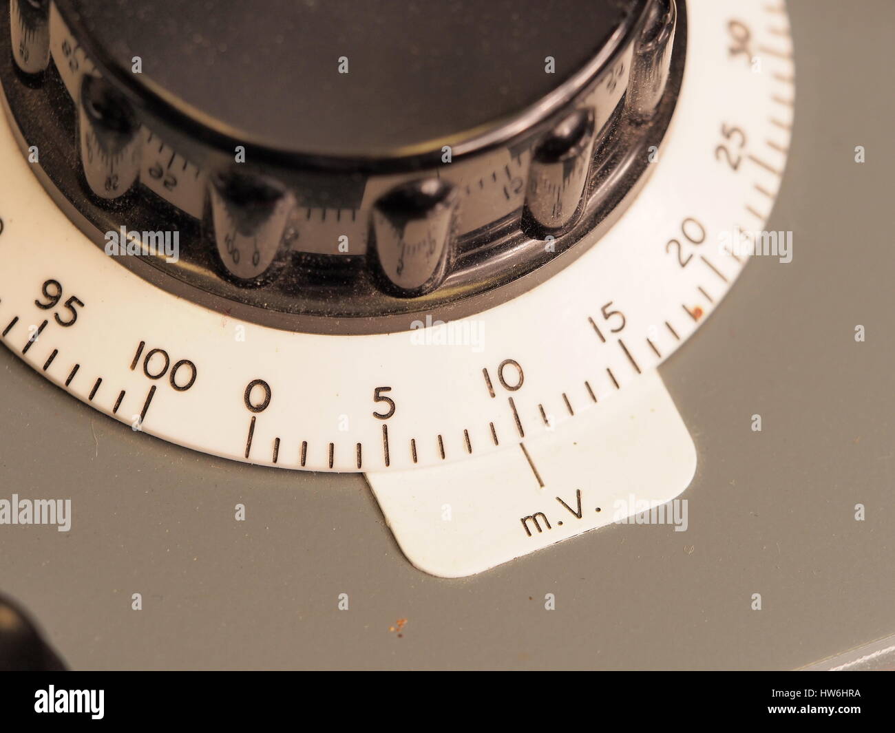 Big black hand knob with rotating scale on an old test apparatus ...
