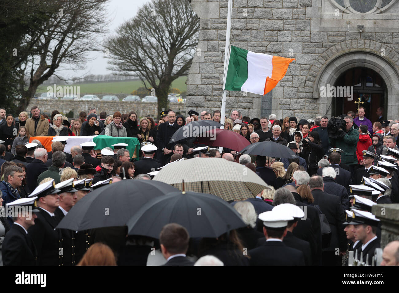 The coffin arrives for the funeral of Captain Dara Fitzpatrick, who ...
