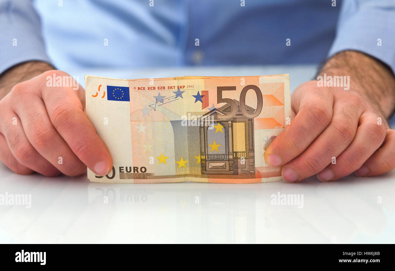 Man handling money Stock Photo - Alamy