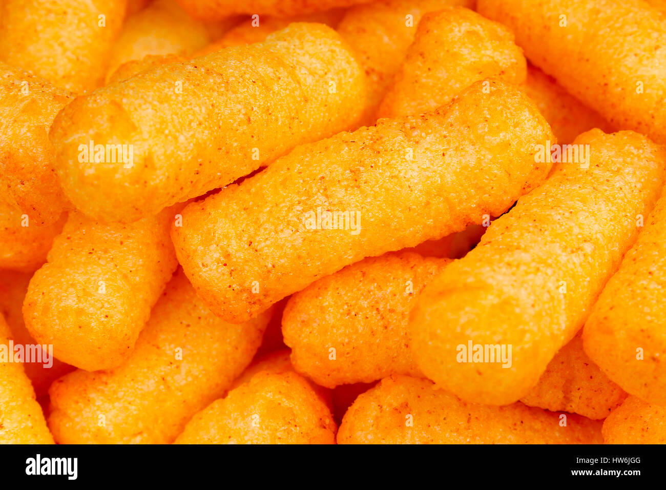 Cheese puff texture Stock Photo - Alamy