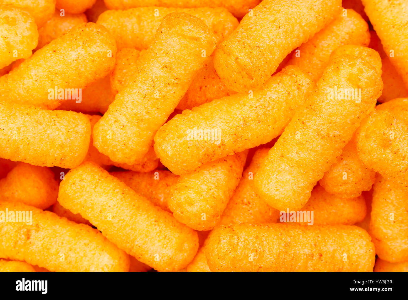 Cheese puff texture Stock Photo - Alamy