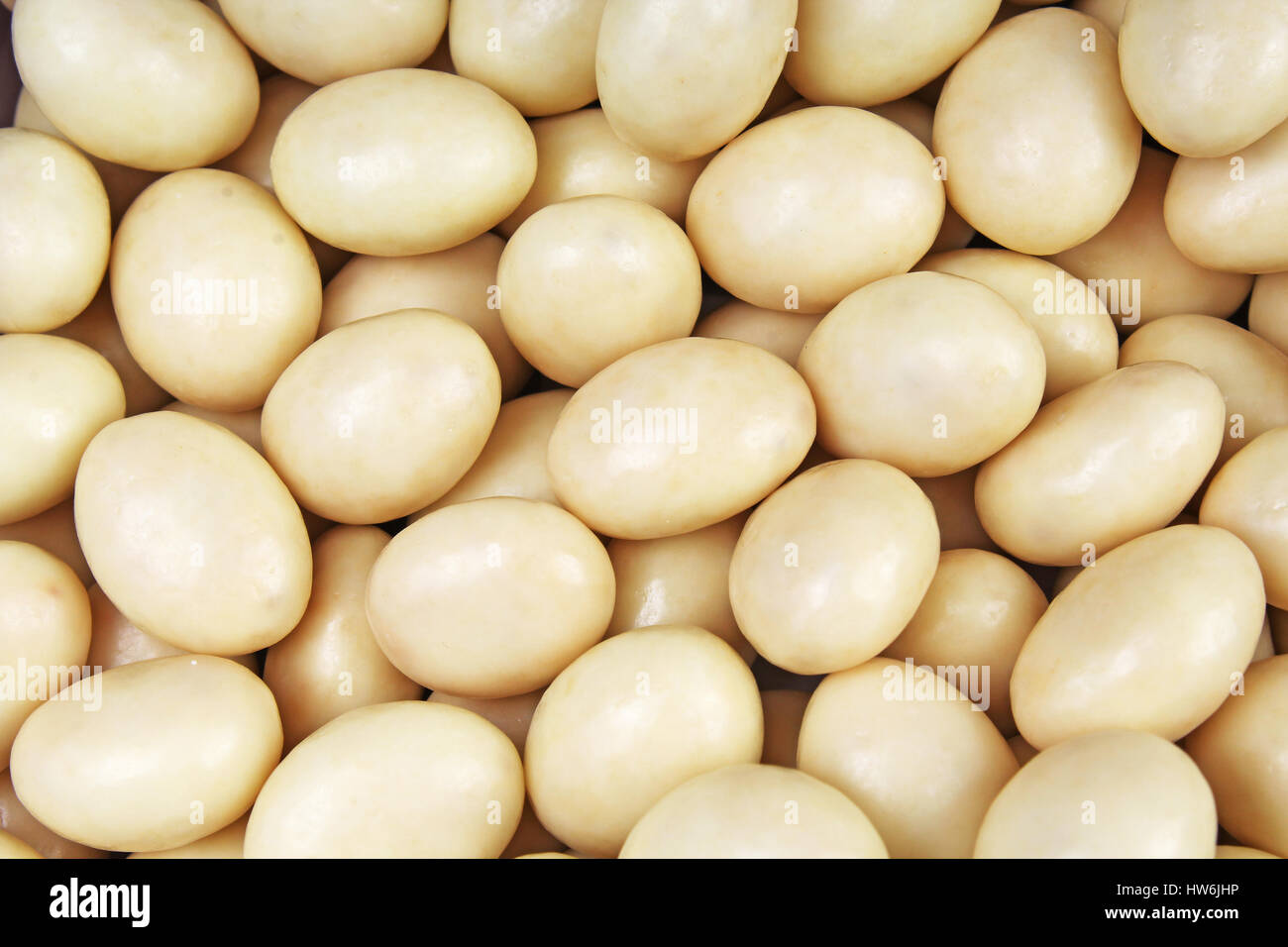 White chocolate drops balls Stock Photo - Alamy