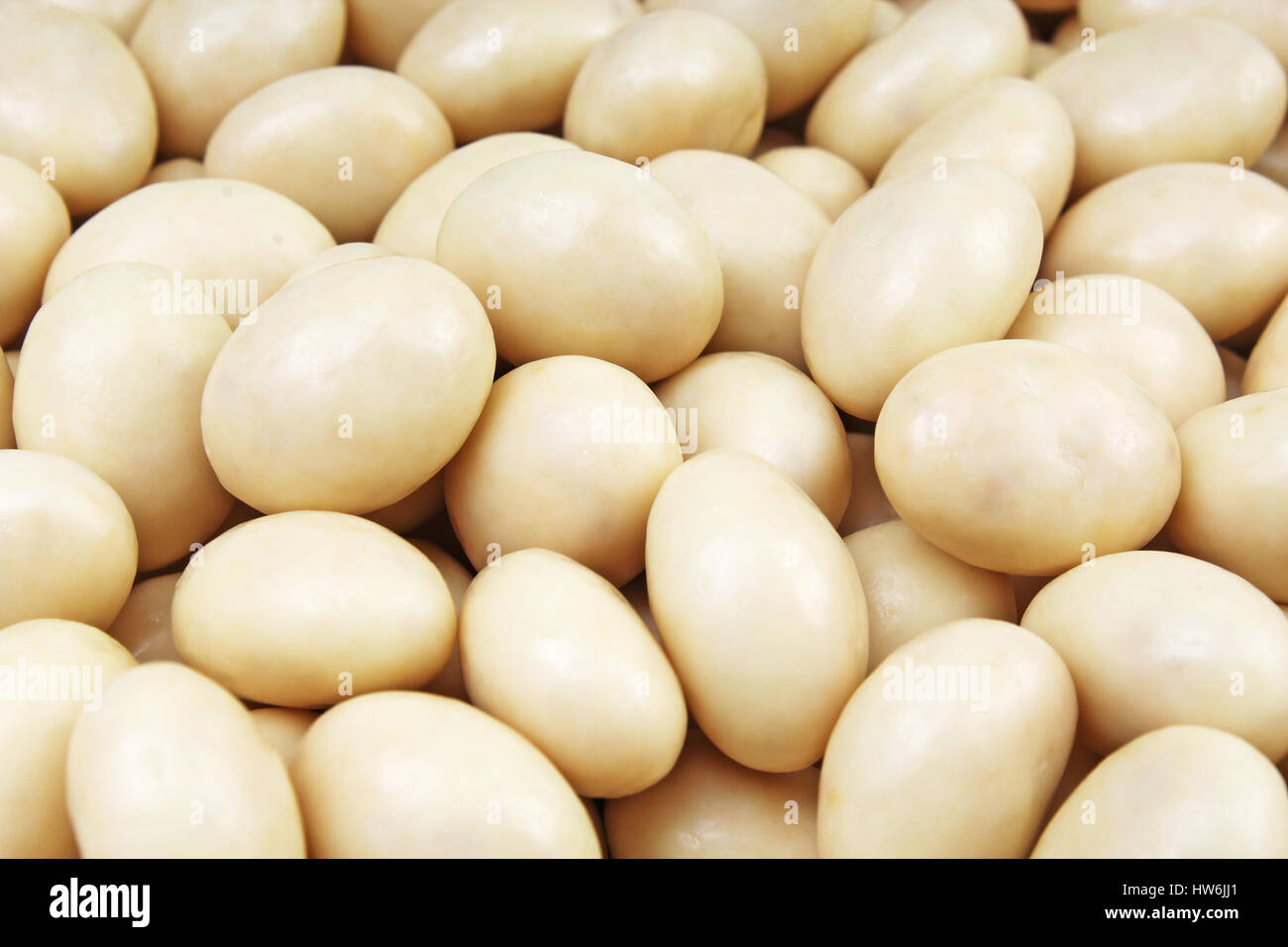 White chocolate drops balls Stock Photo - Alamy