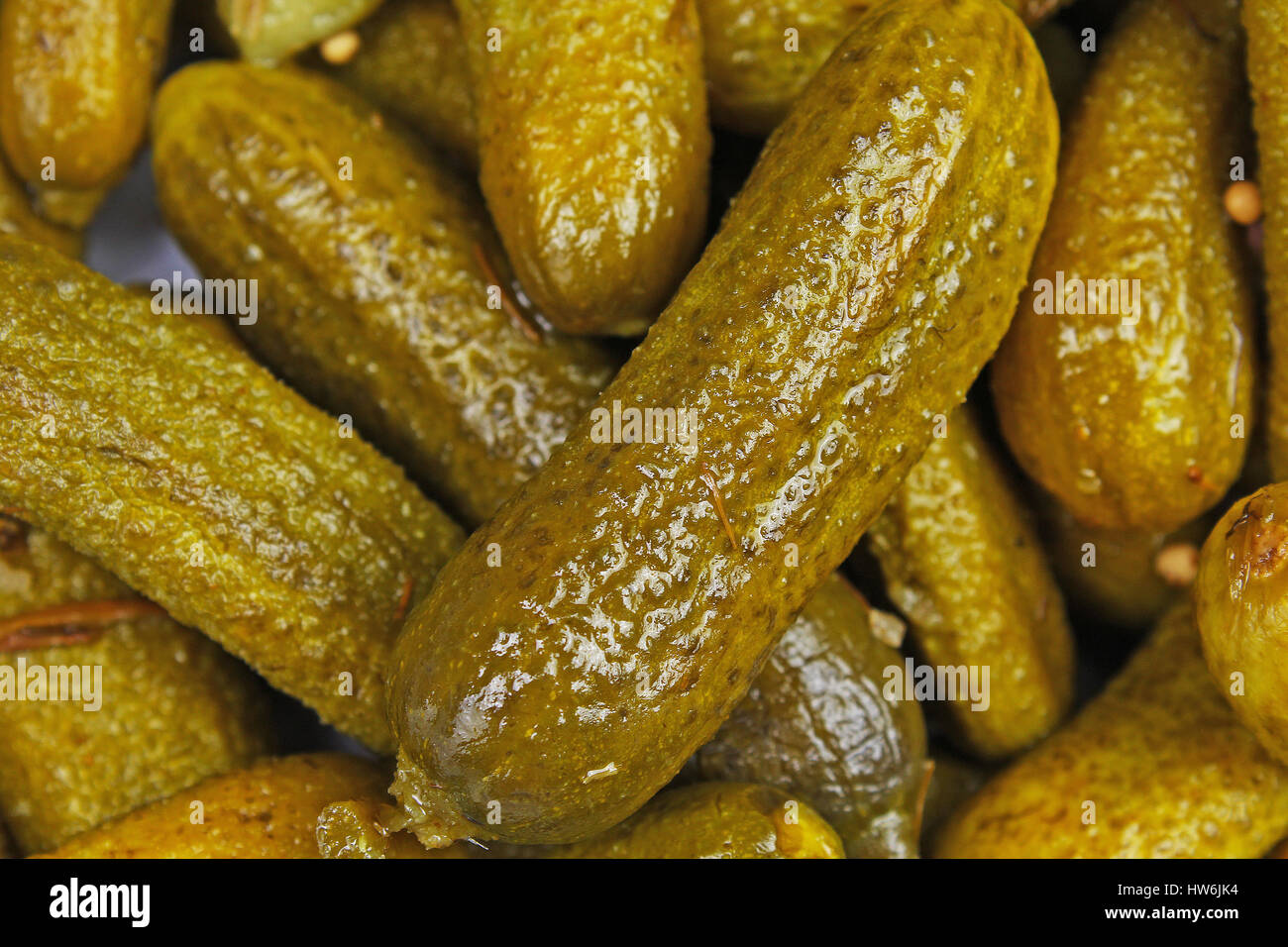 Cucumbers as background. Green pickled cucumber Stock Photo - Alamy