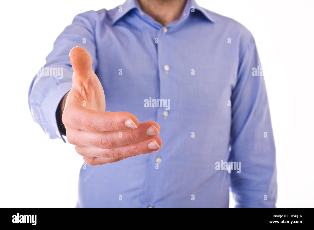 Young business man giving hand Stock Photo - Alamy