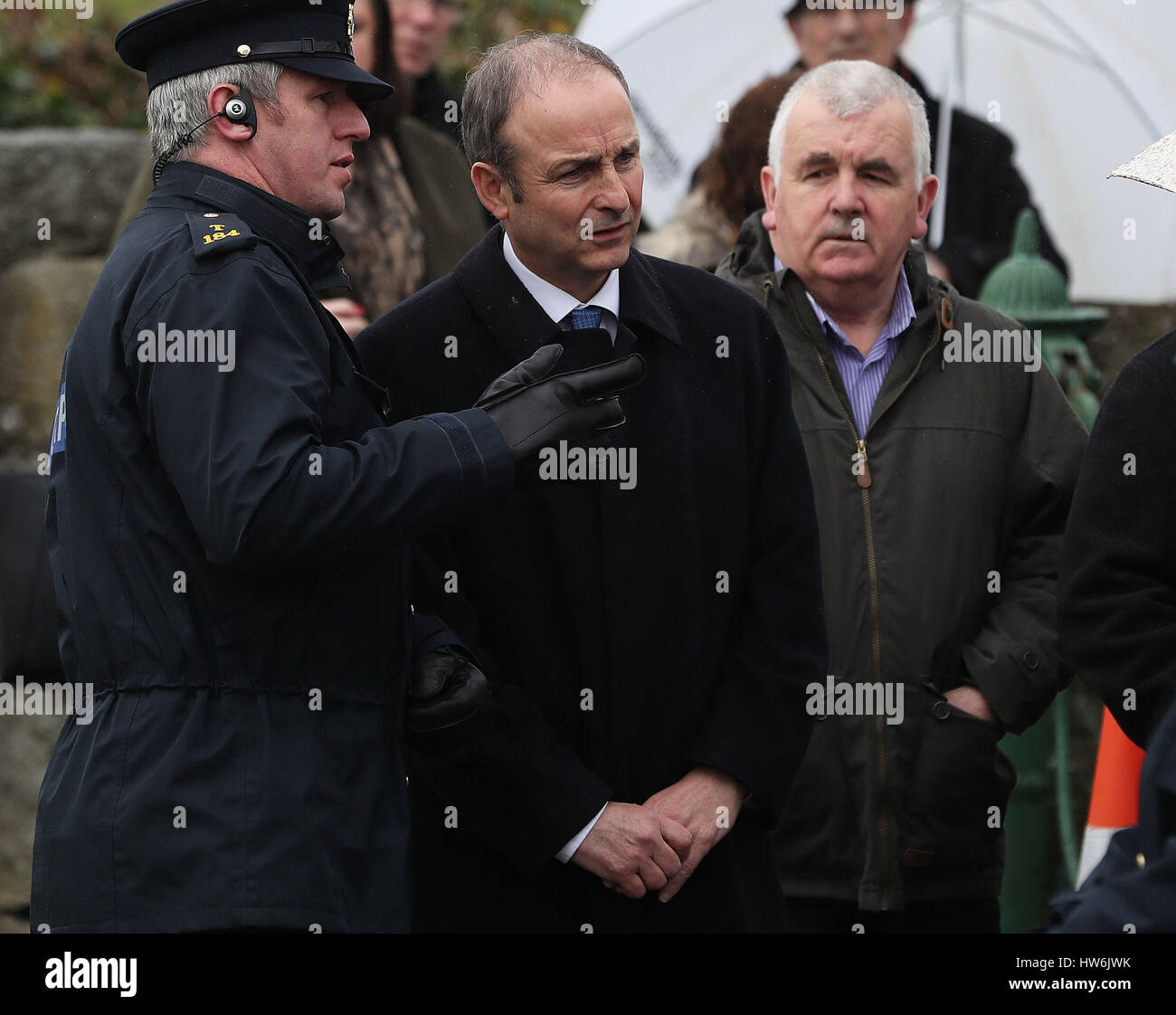 Leader of Fianna Fail Micheal Martin arrives for the funeral of Captain ...