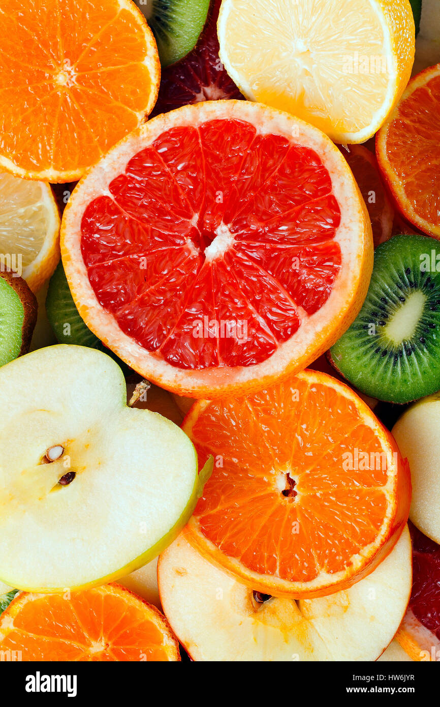 Fruits. Half fruits as background Stock Photo - Alamy