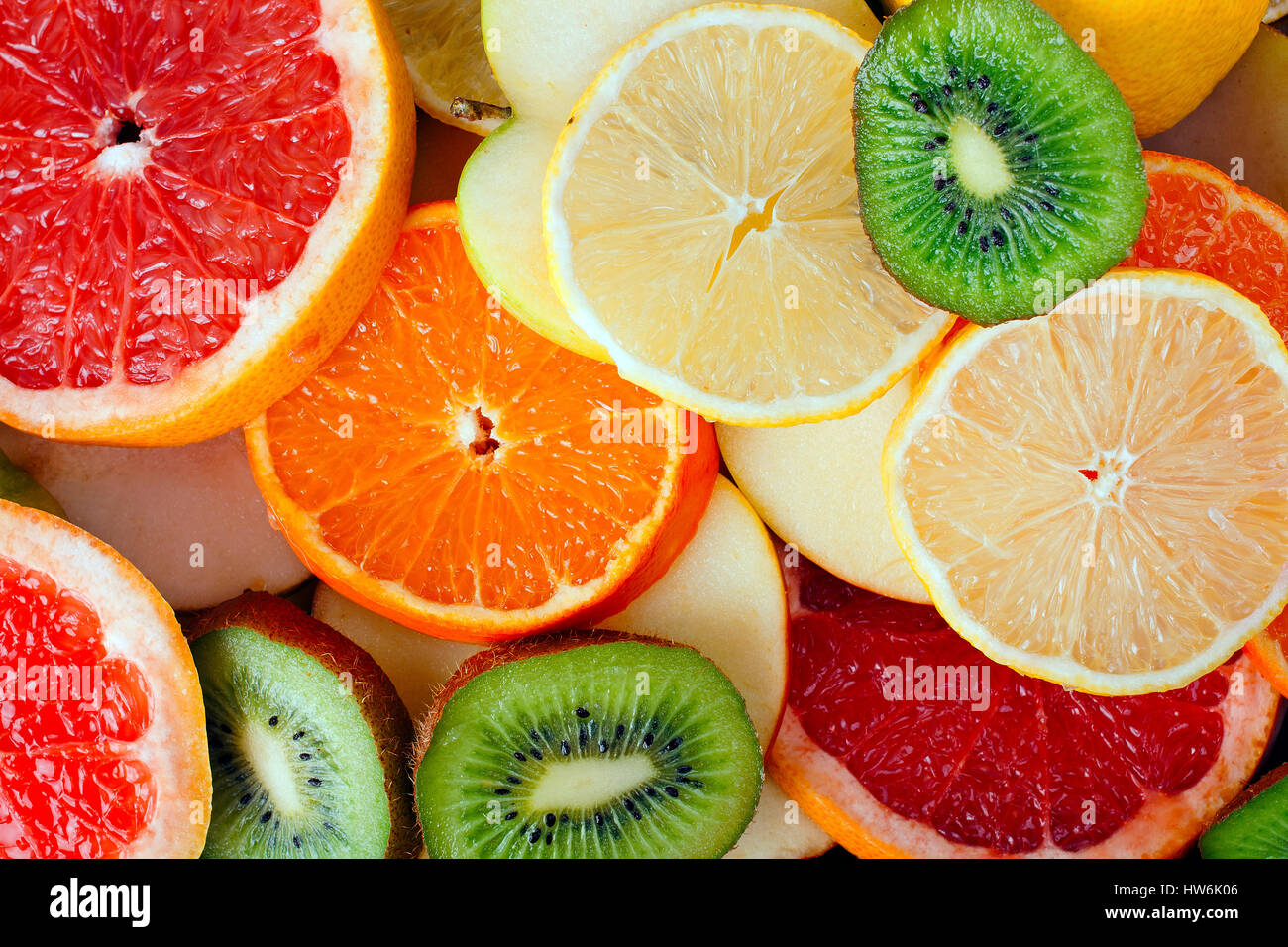 Fruits. Half fruits as background Stock Photo - Alamy
