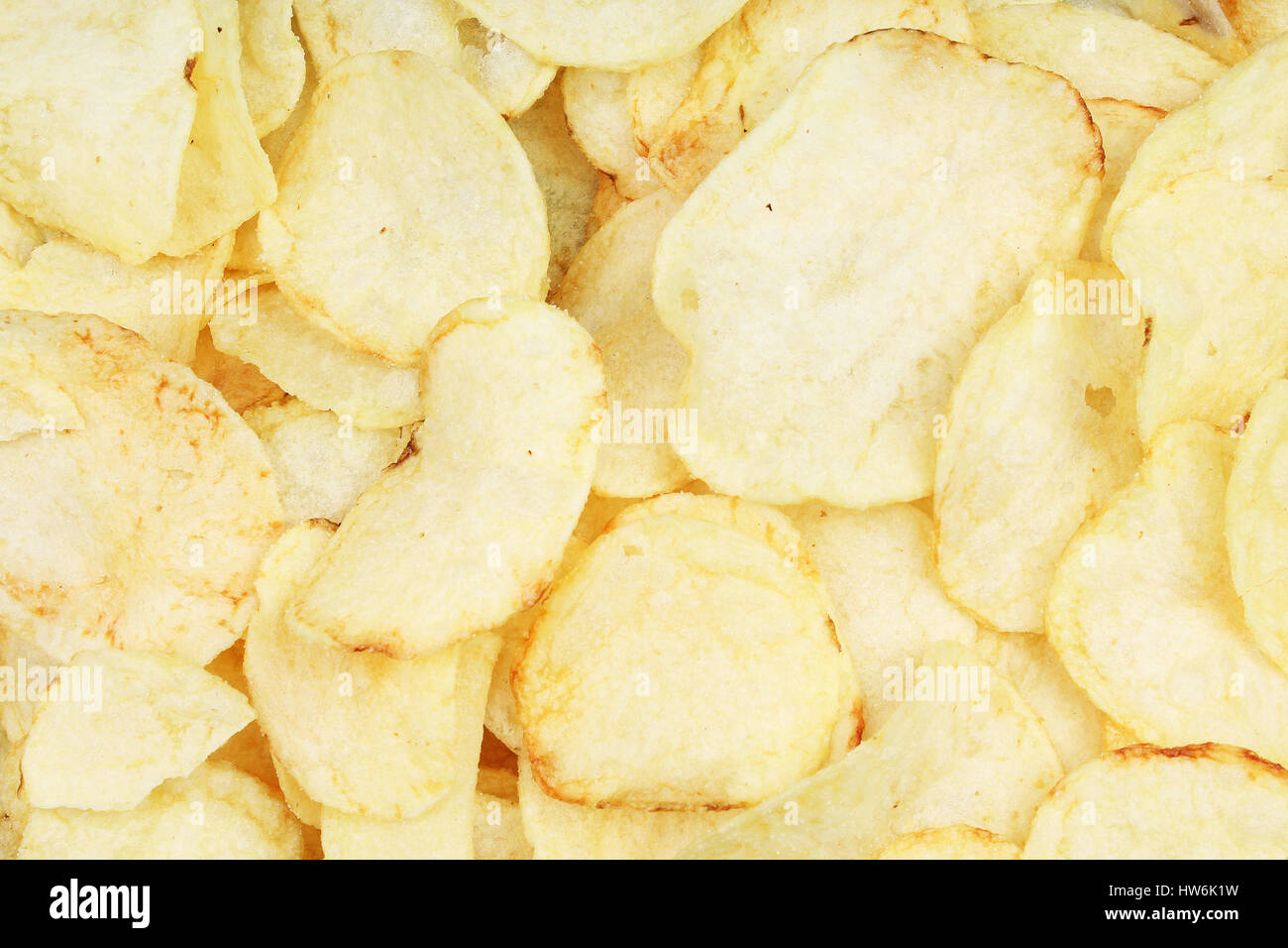 Potato chips texture background Stock Photo - Alamy