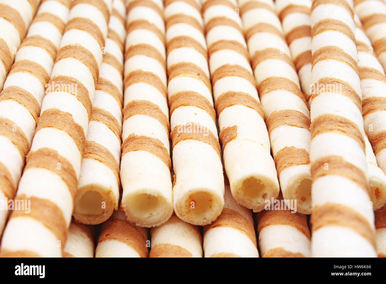 Ice cream wafer sticks. Curled wafer curls as background Stock Photo ...