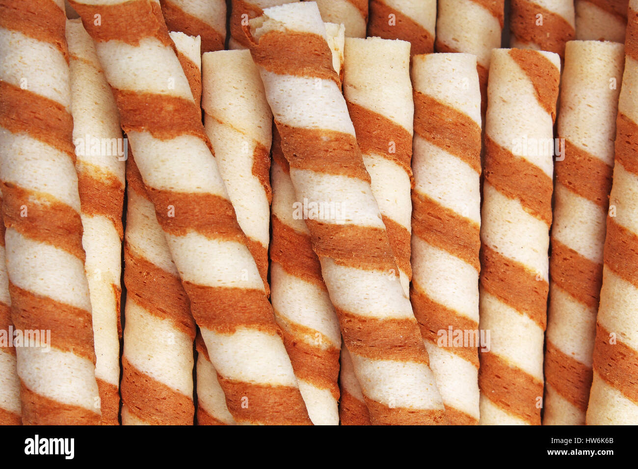 Ice cream wafer sticks. Curled wafer curls as background Stock Photo ...