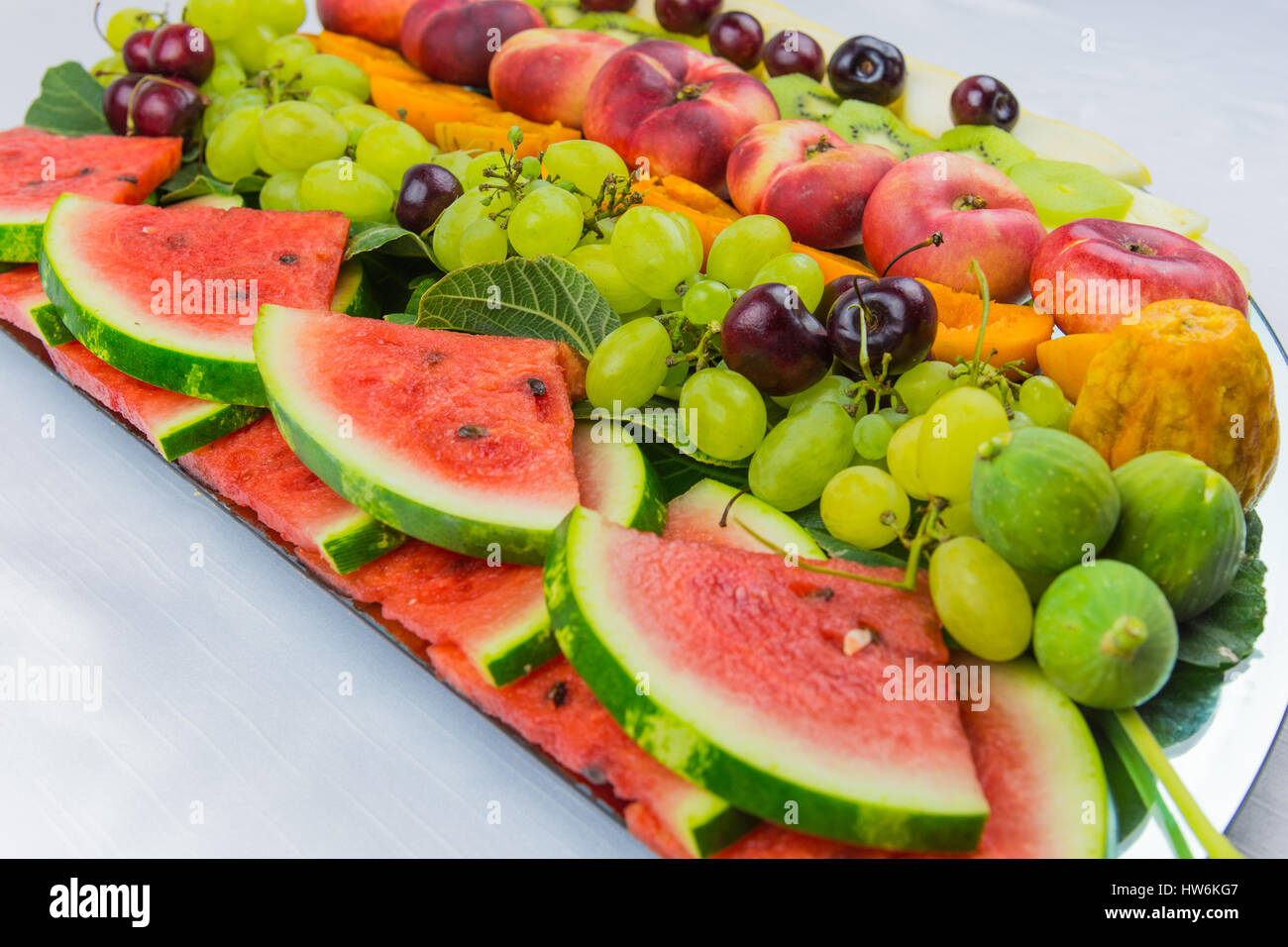 compositions of fresh fruit cut for buffets. typical summer fruits of ...