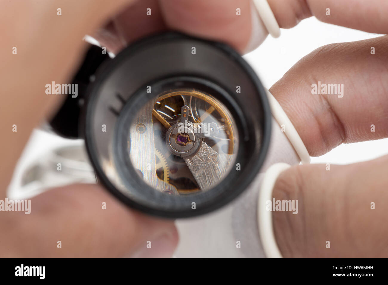 watchmaker repairing the automatic wristwatch, watch repairing concept ...