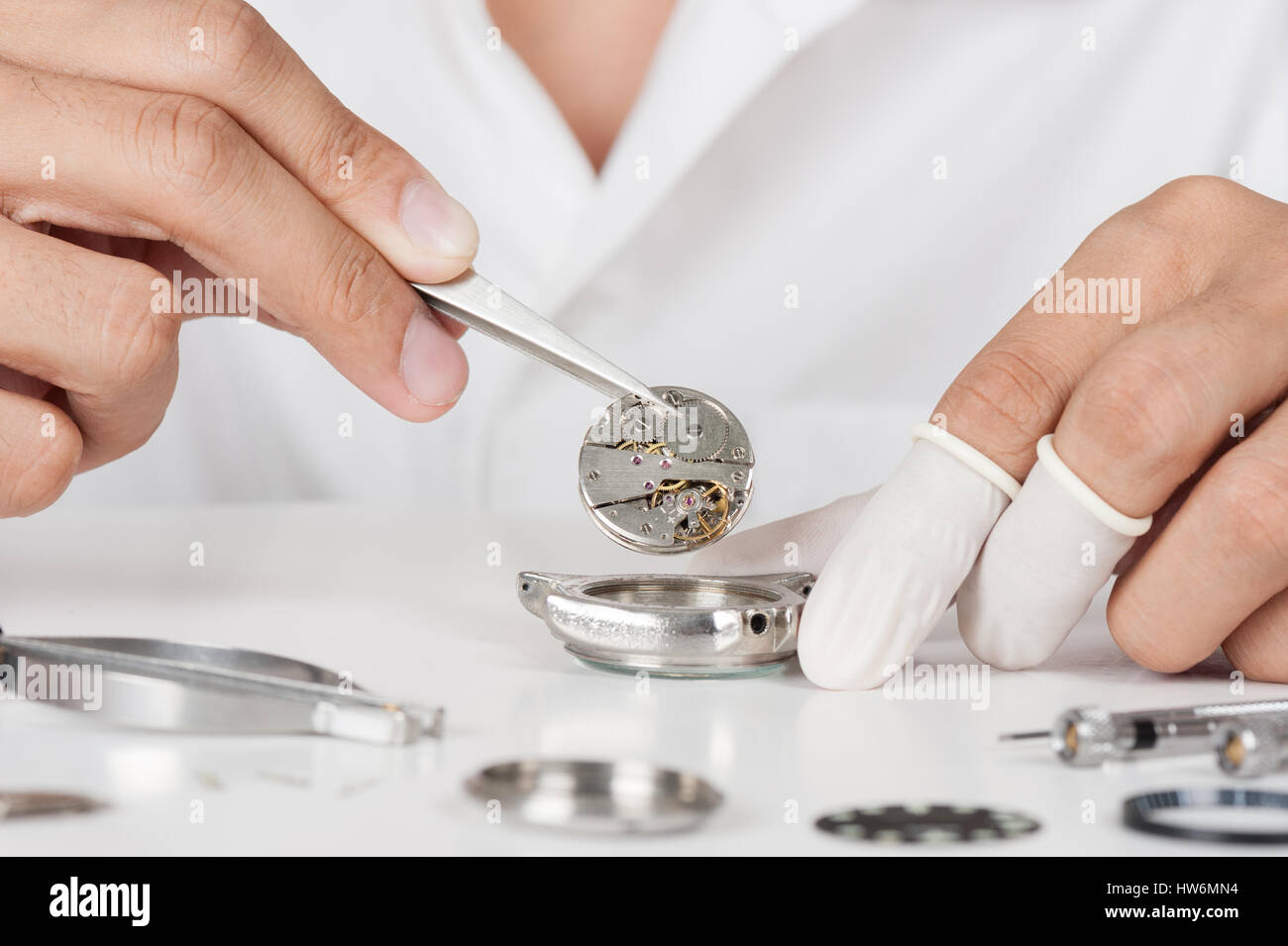 closeup hands of watchmaker repairing the luxury wristwatch Stock Photo ...