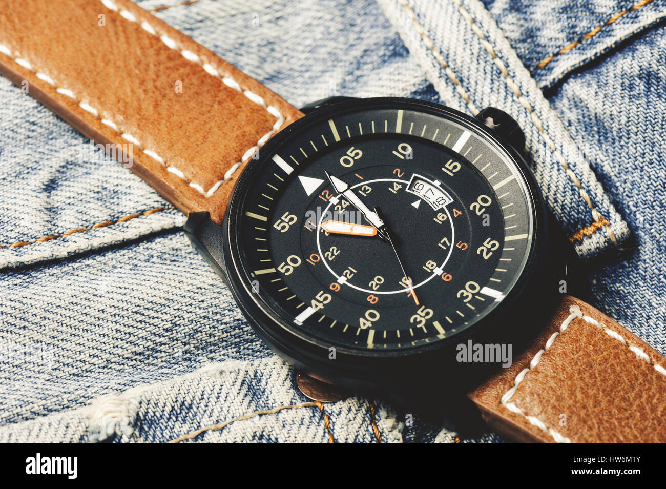 military style watch with brown leather strap Stock Photo - Alamy