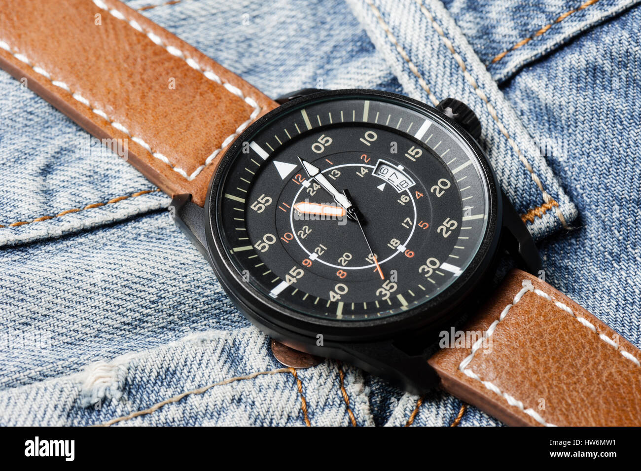 military style watch with brown leather strap Stock Photo - Alamy