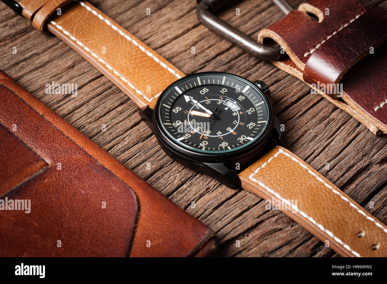 military style watch with brown leather strap Stock Photo - Alamy