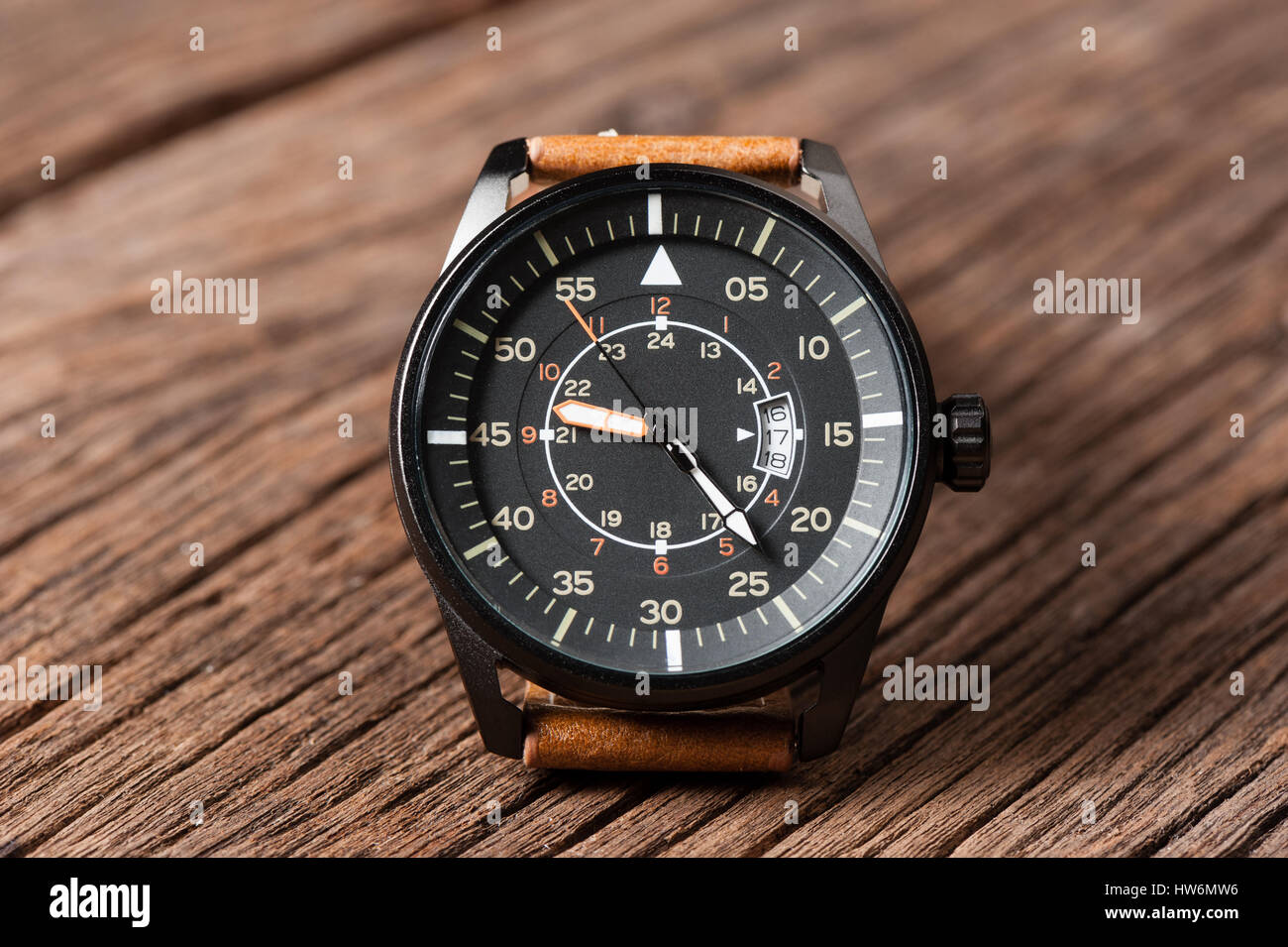 military style watch with brown leather strap Stock Photo - Alamy