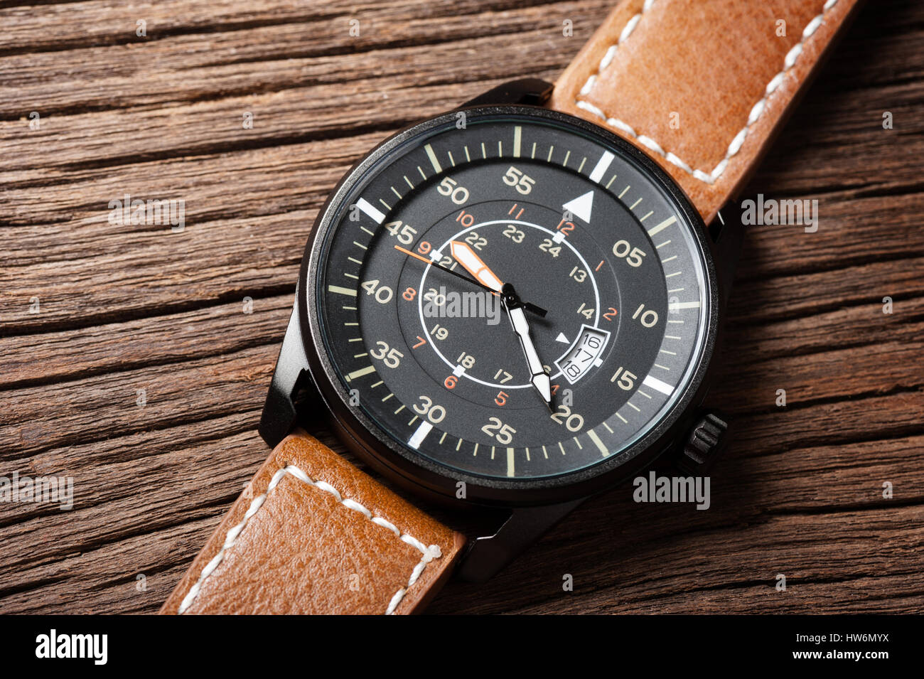 military style watch with brown leather strap Stock Photo - Alamy