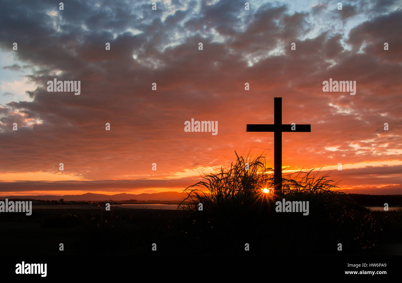 Cross on a hill as the morning sun comes up for the day Stock Photo - Alamy
