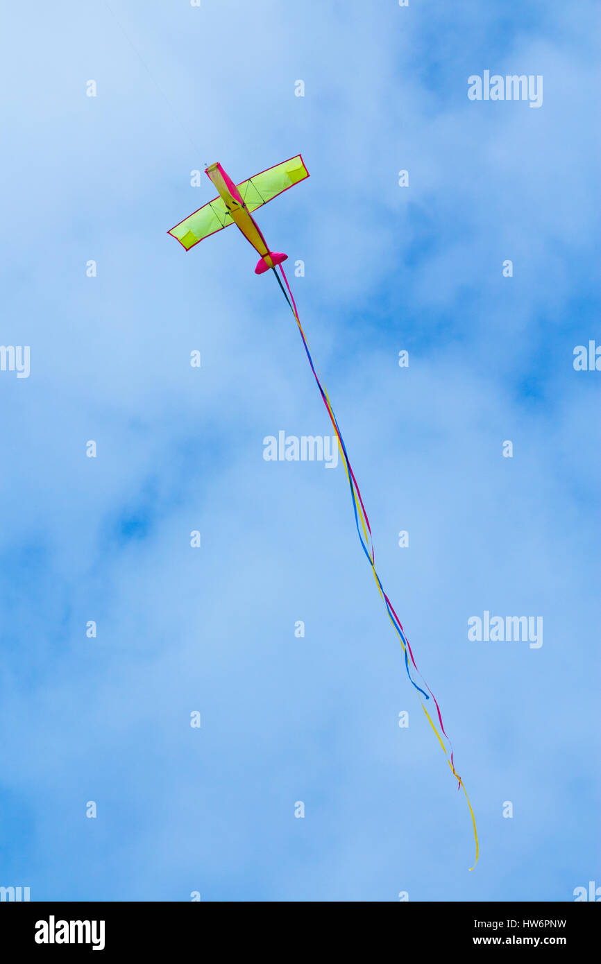 Kite plane flying up high in the sky Stock Photo - Alamy