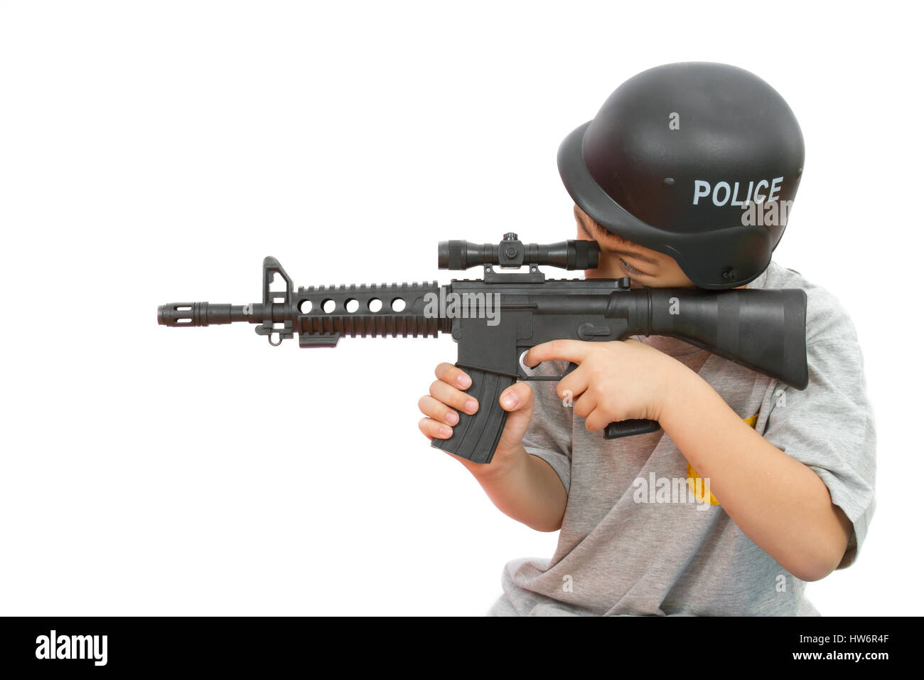 Chinese kid playing toy gun hi-res stock photography and images - Alamy